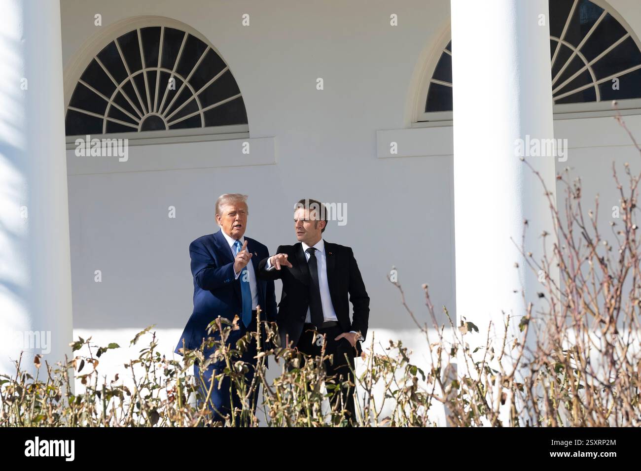 President Donald Trump walks along the West Colonnade with French ...