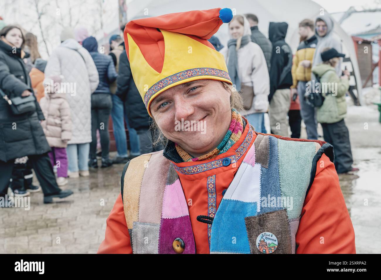 Kolomna, Russia, 17 March 2024. A man in a colourful Skomorokh outfit ...