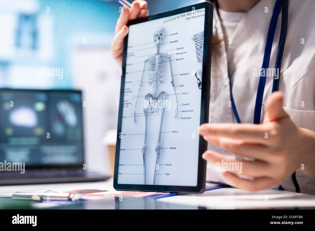Healthcare professional shows lab test results to patient at ...