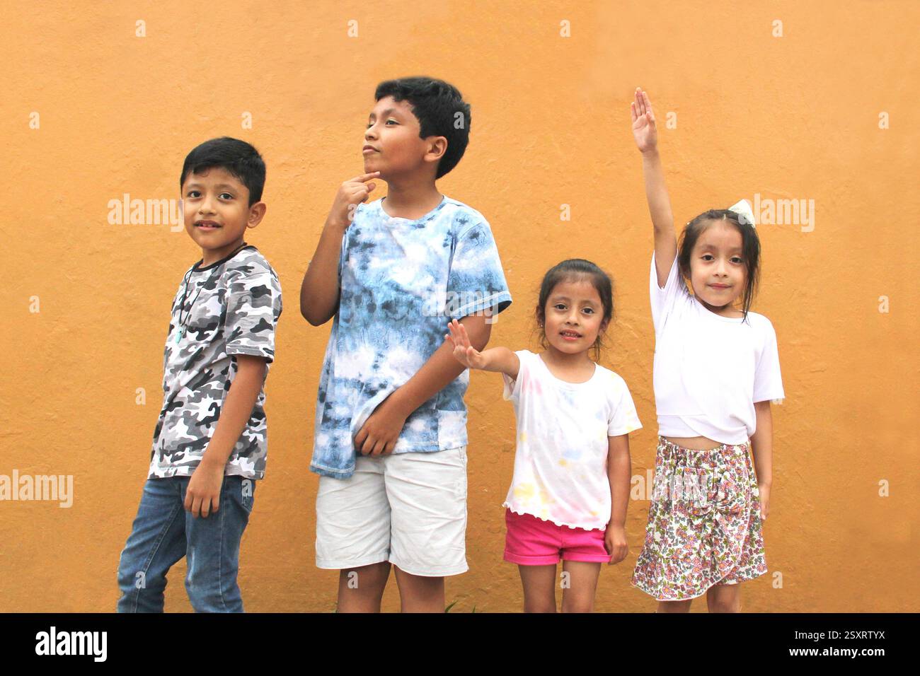 Boys and girls together play and have fun outdoors celebrating their ...