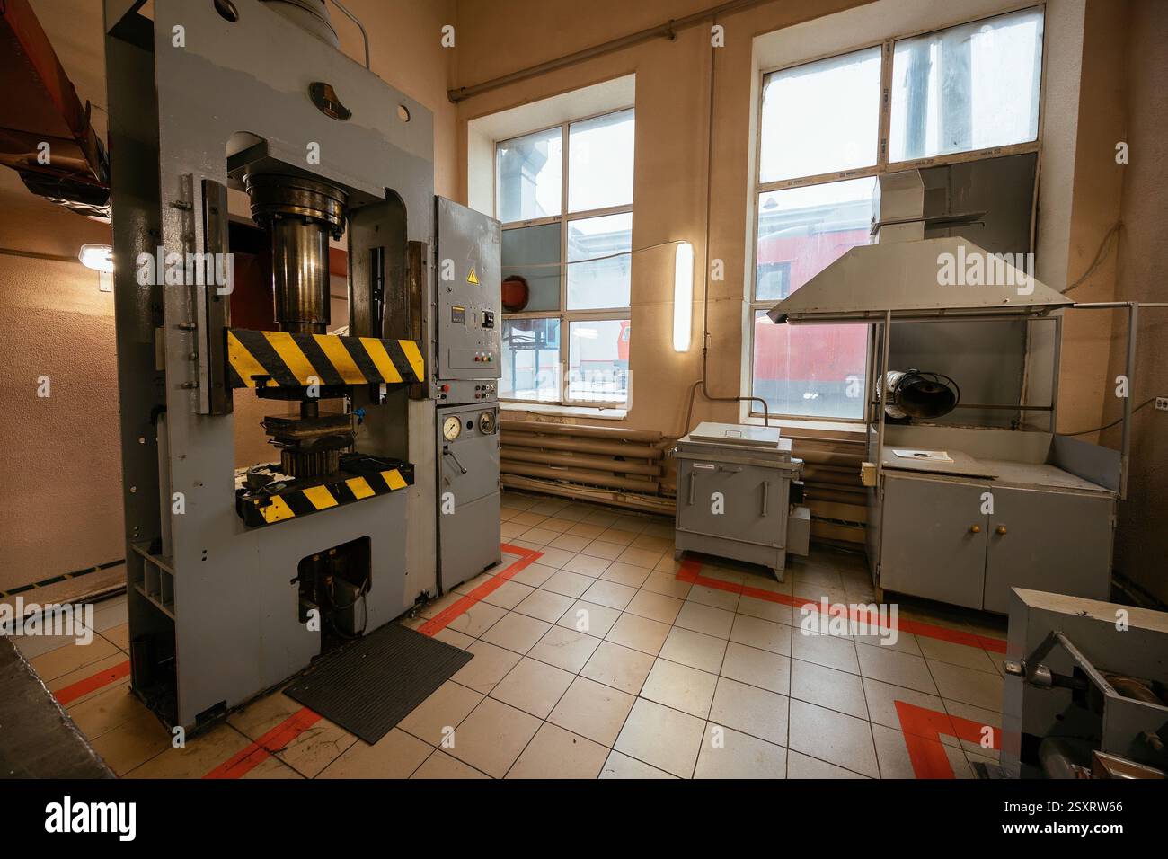 Hydraulic press for rubber and plastic casting Stock Photo - Alamy