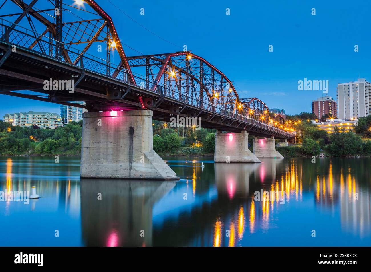 Bridge with lights on it. The bridge is over a river Stock Photo - Alamy