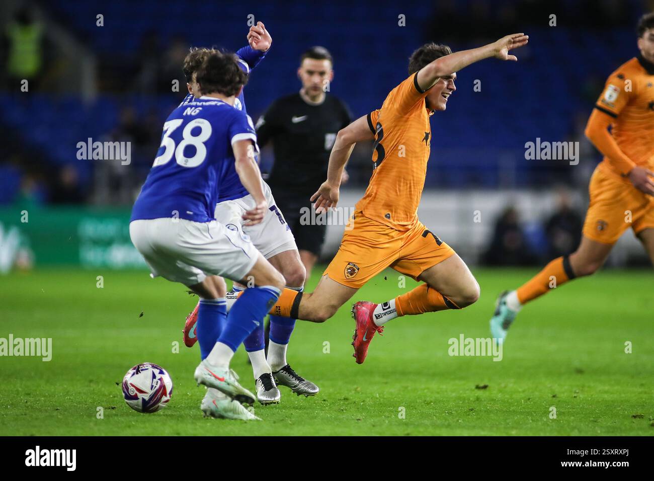 Kyle Joseph of Hull City is tackled by Perry Ng of Cardiff City during ...