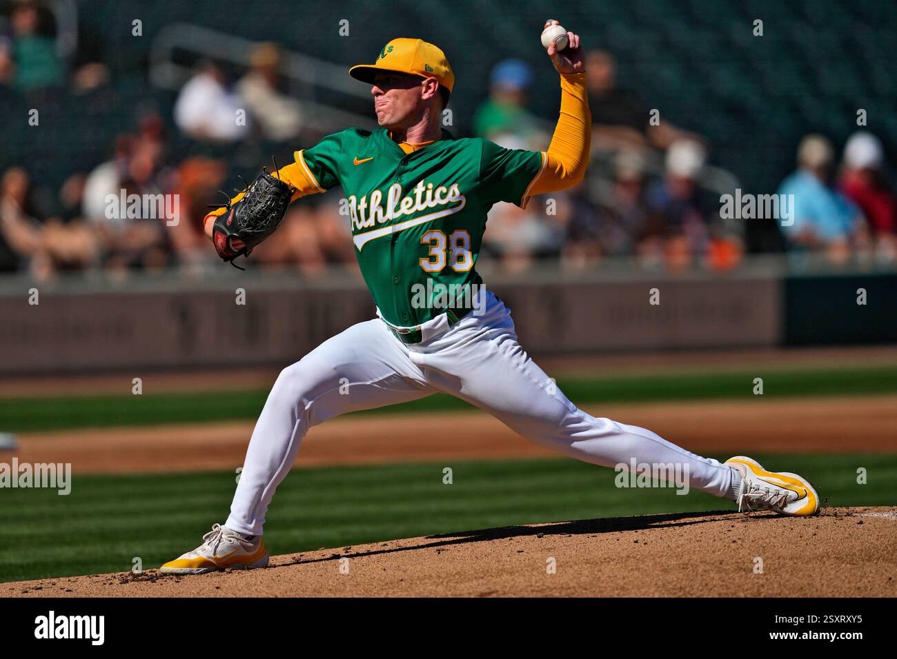 The Athletics pitcher JP Sears throws against the San Francisco Giants ...