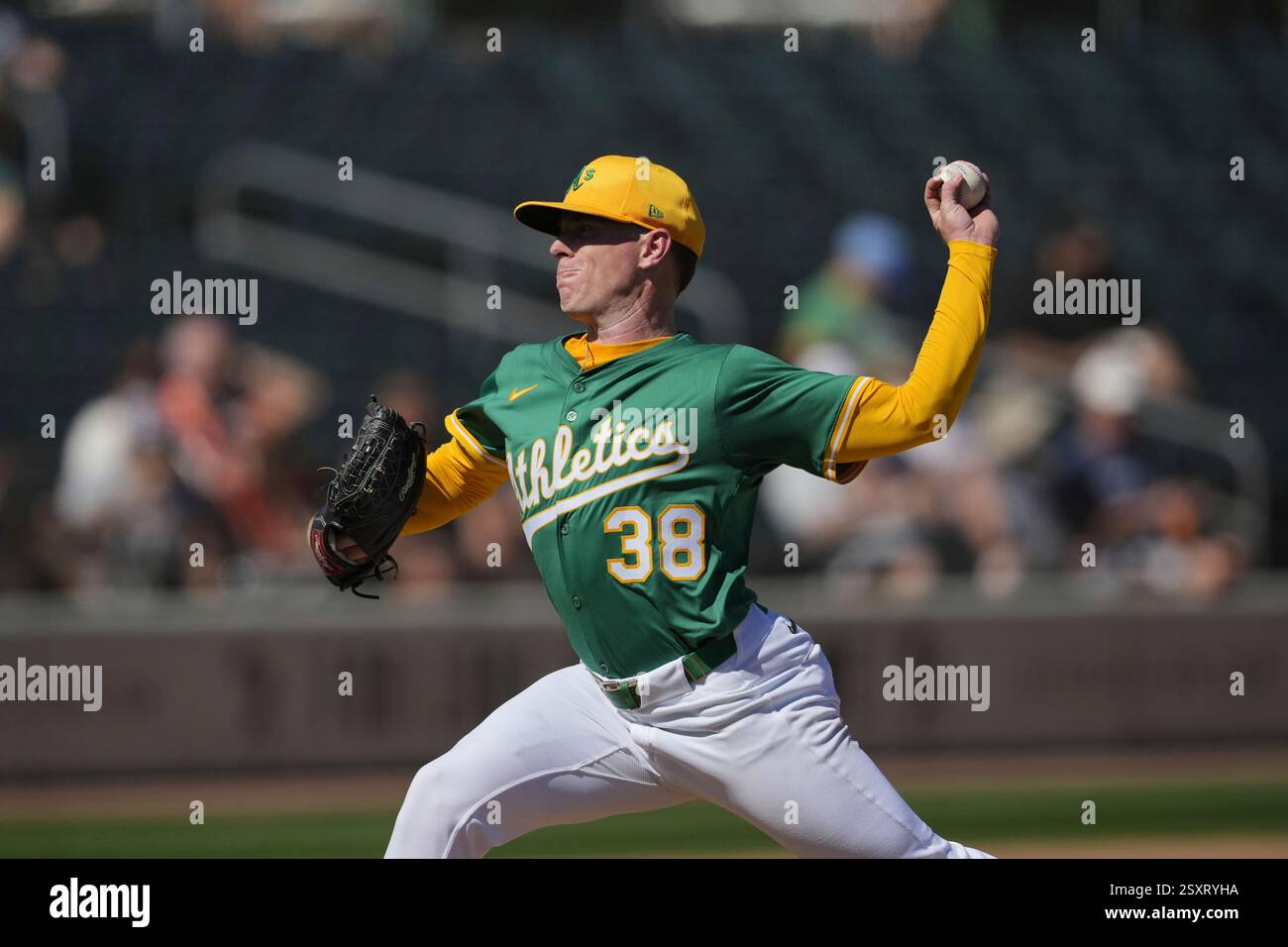 The Athletics pitcher JP Sears throws against the San Francisco Giants ...