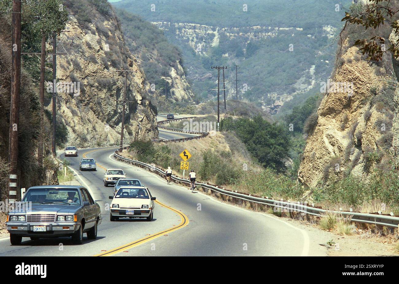 Los Angeles, CA, USA, approx. 1993. Autovehicles and bikers on Malibu ...