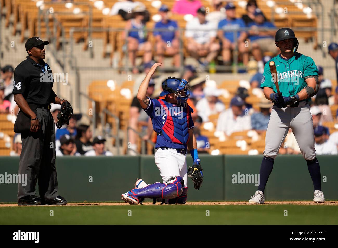 Los Angeles Dodgers catcher Austin Barnes, center, reacts to a replay ...