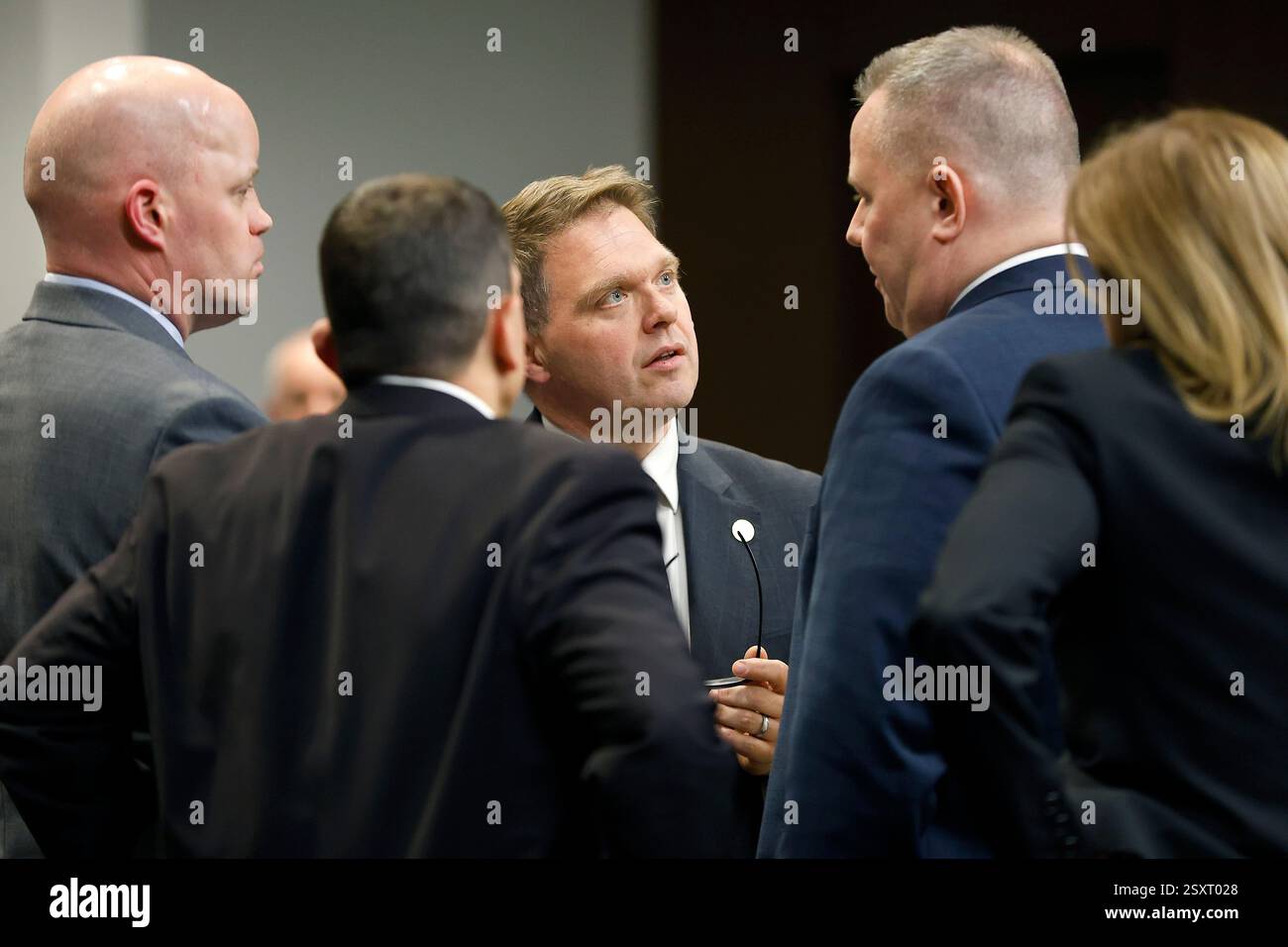 Lake County State's Attorney Eric Rinehart speaks with his team ...