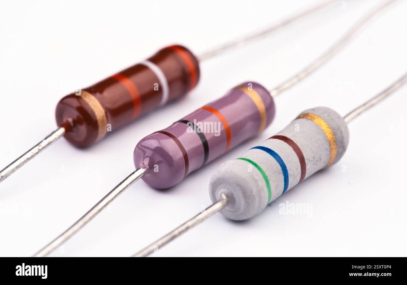 Close examination of three different resistors, showcasing their unique ...