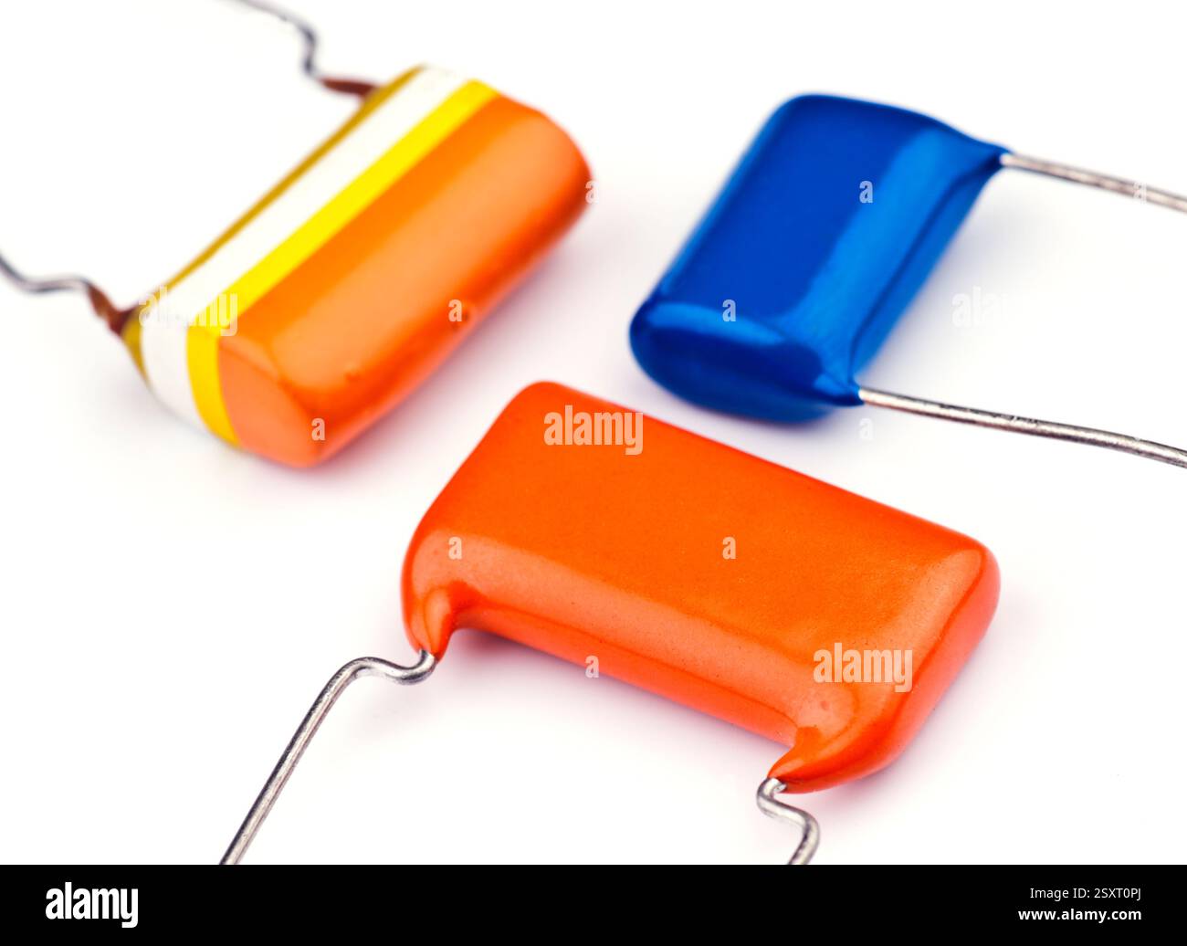 Bright, colorful capacitors arranged on a white background highlight the critical role of these ...