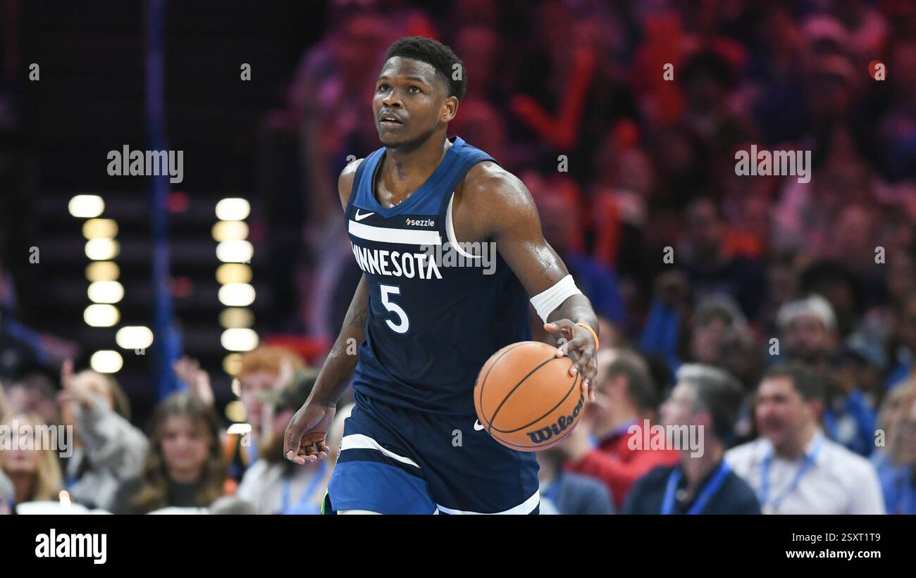 Minnesota Timberwolves guard Anthony Edwards pushes down the court ...
