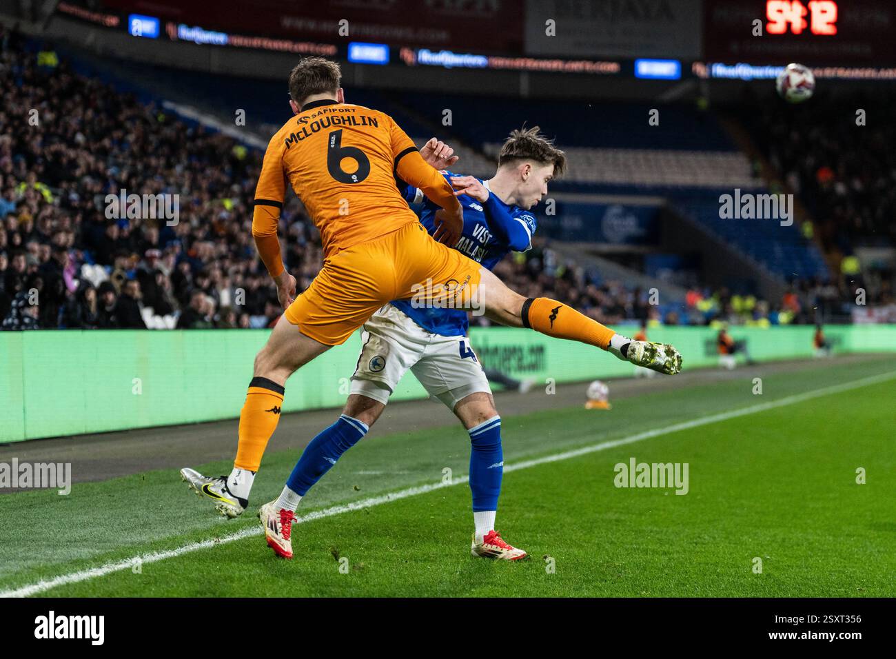 Cardiff, UK. 25th Feb, 2025. Sean McLoughlin of Hull City clears the ...
