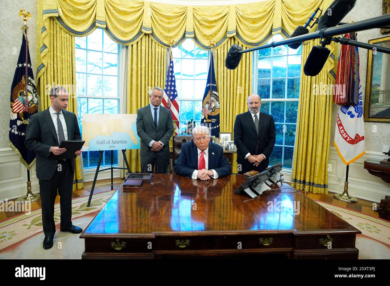 US President Donald Trump talks to reporters alongside HSS Secretary ...