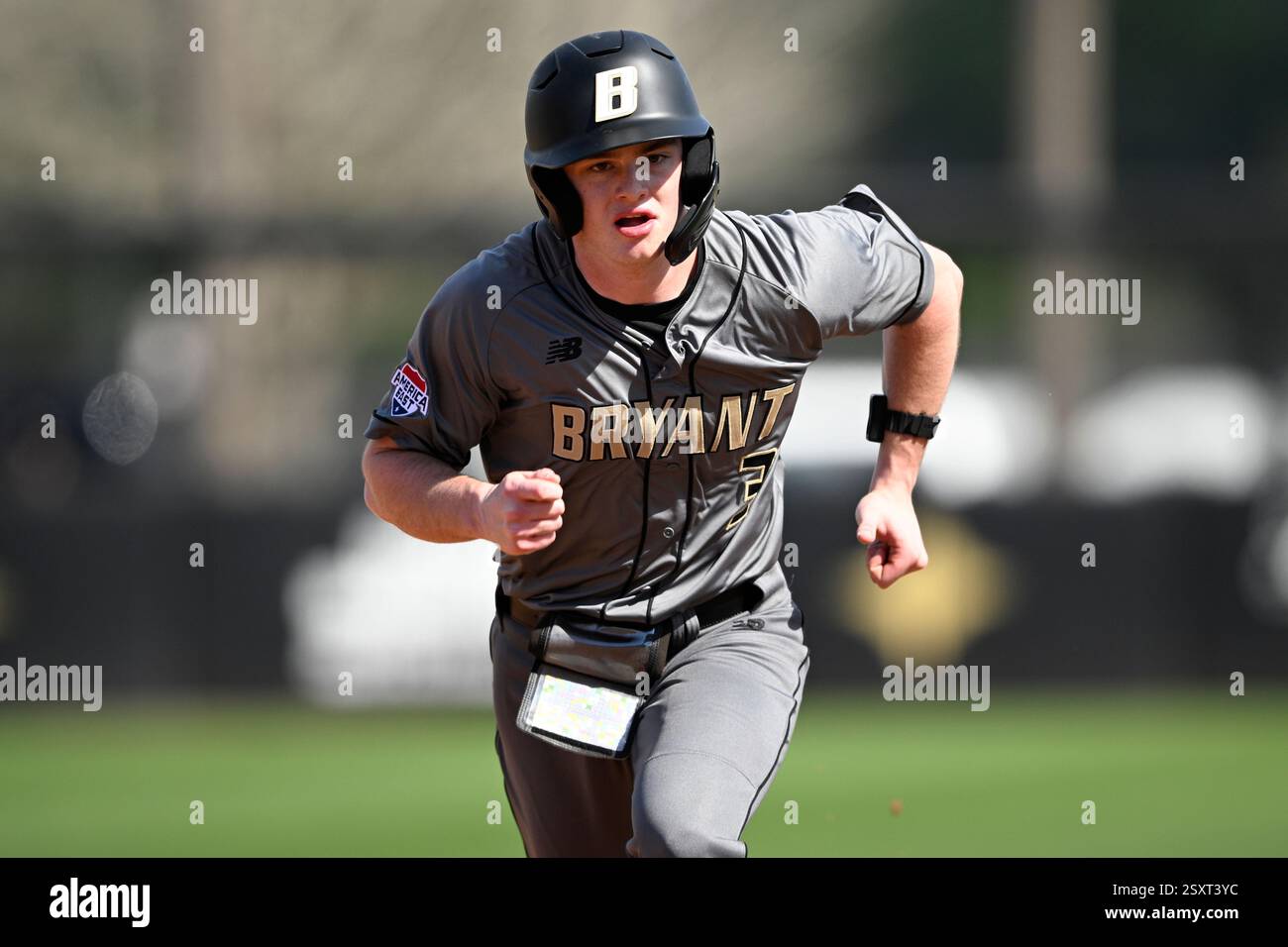 Bryant's Shea Grady (3) runs during an NCAA college baseball game ...
