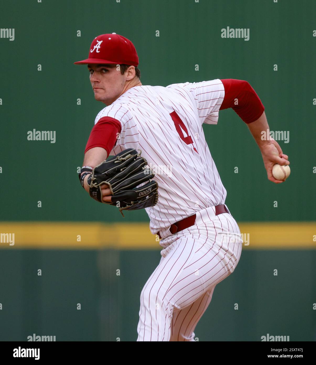 Alabama pitcher Riley Quick throws a pitch during an NCAA baseball game ...