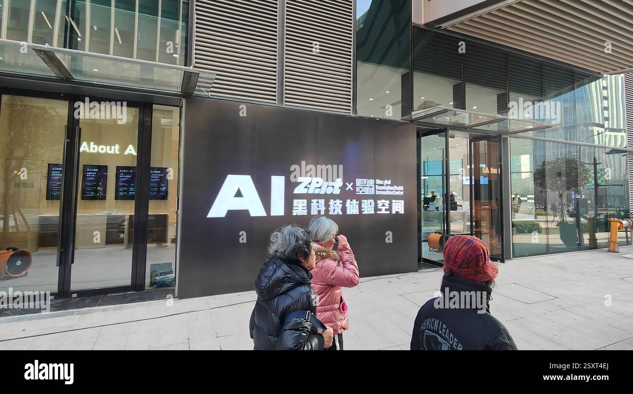 SHANGHAI, CHINA - FEBRUARY 24, 2025 - Citizens pass through the AI ...