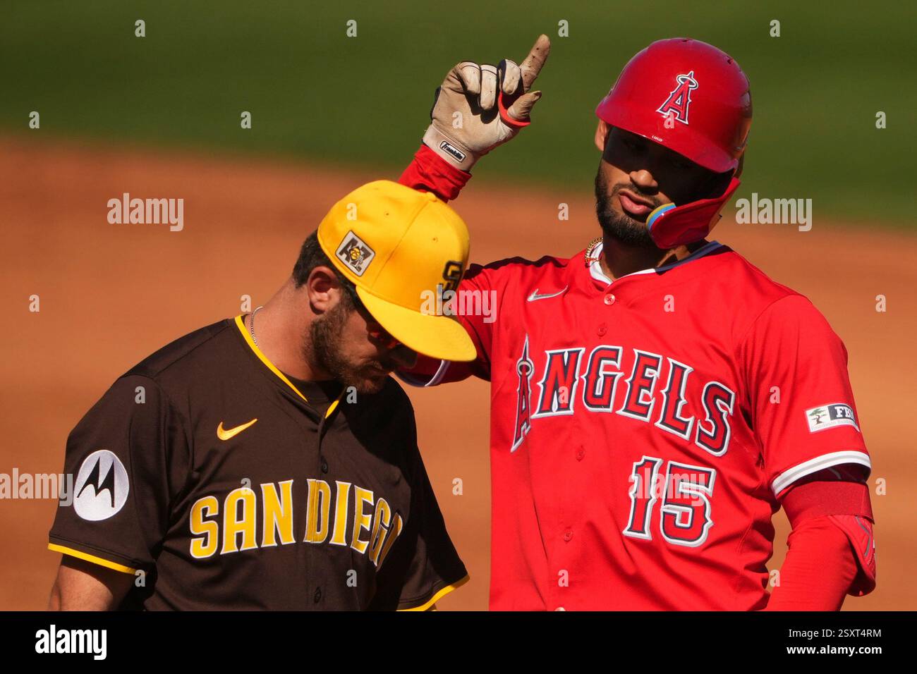 Los Angeles Angels' Matthew Lugo (15) reacts to hitting a single ...