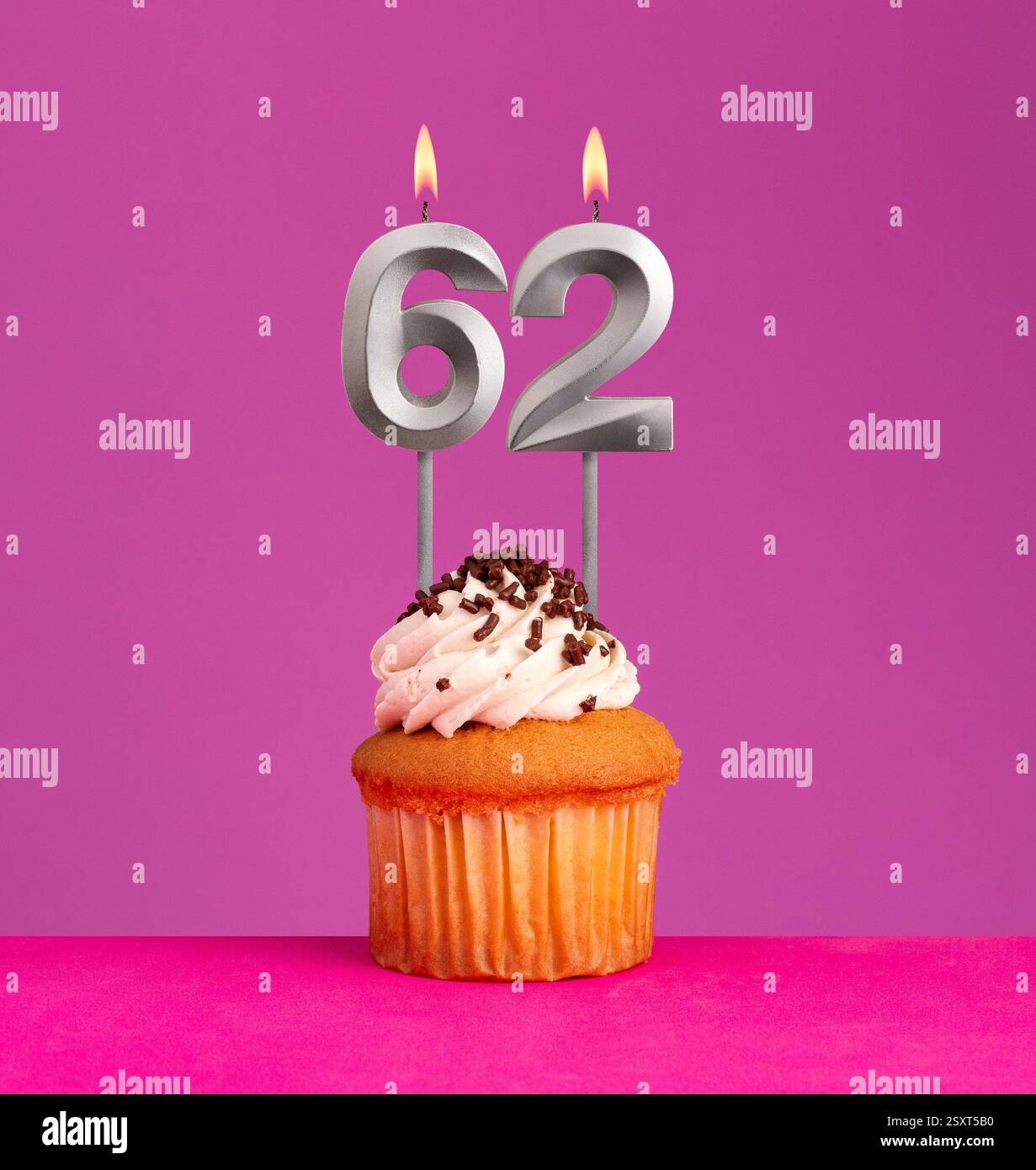 Birthday card on violet background - Candle number 62 Stock Photo - Alamy