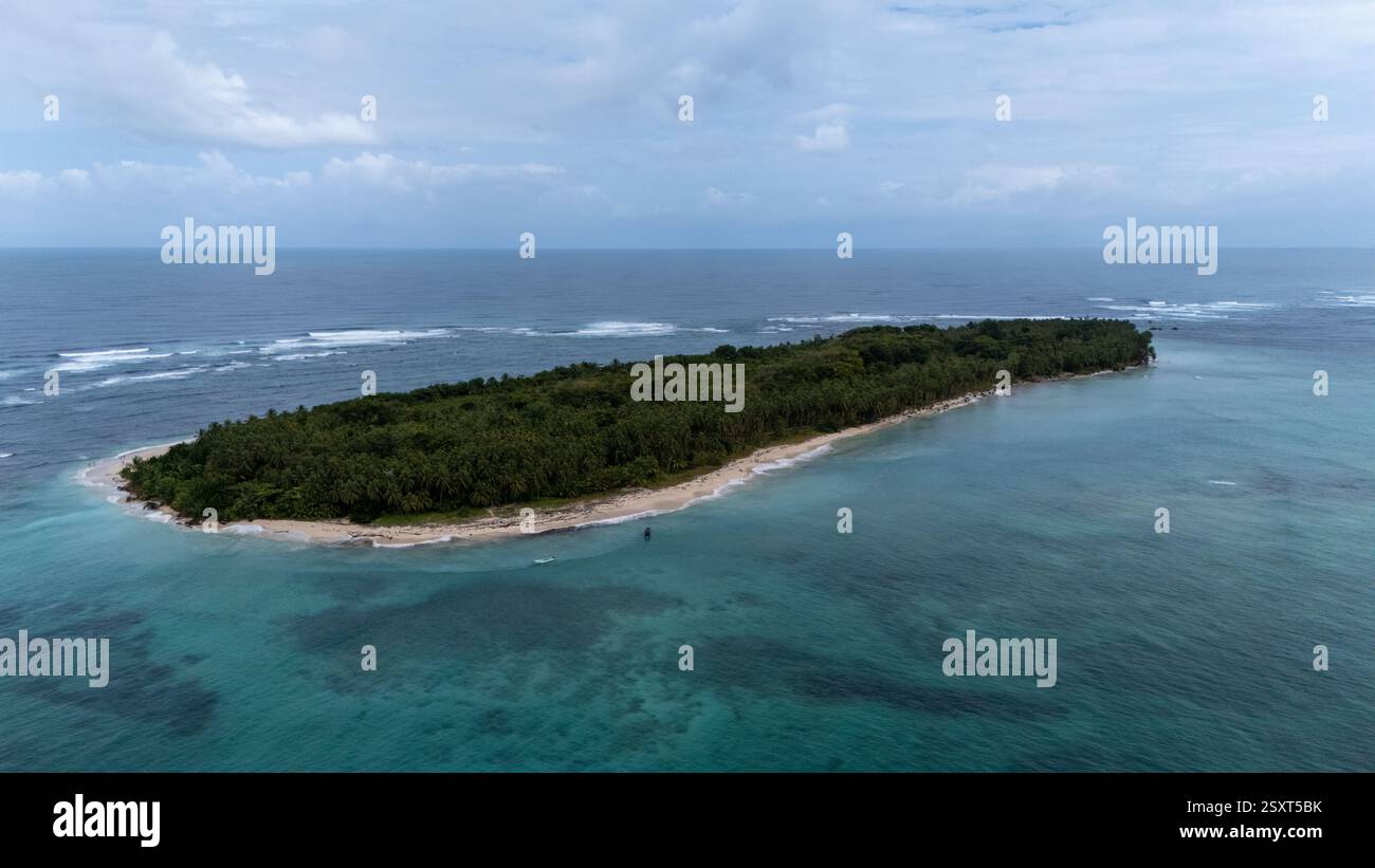 Aerial view of white waves coming to Cayo Zapatilla shore. Bocas del ...