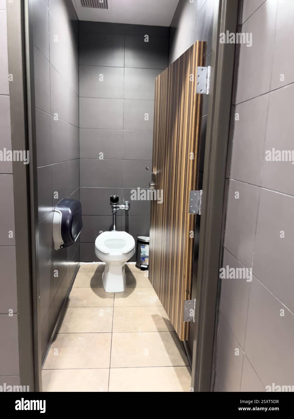 Clean Public Restroom Stalls With White Toilets Stock Photo - Alamy
