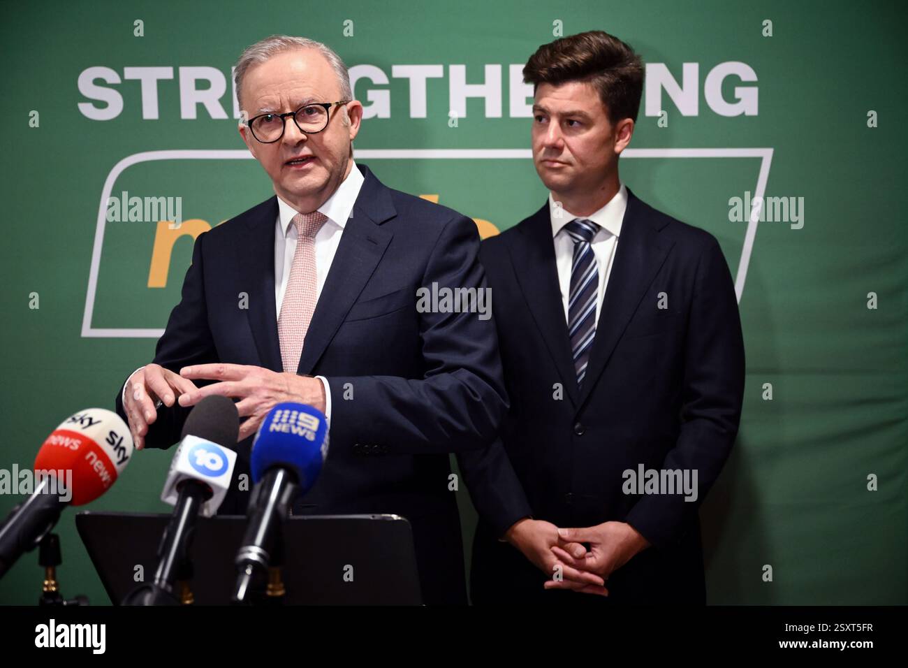 Australian Prime Minister Anthony Albanese (left) and Federal Member ...