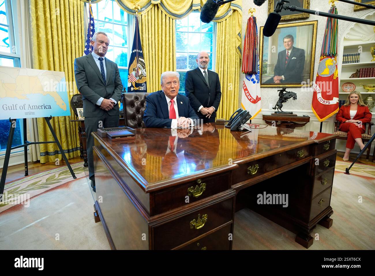 US President Donald Trump talks to reporters alongside HSS Secretary ...