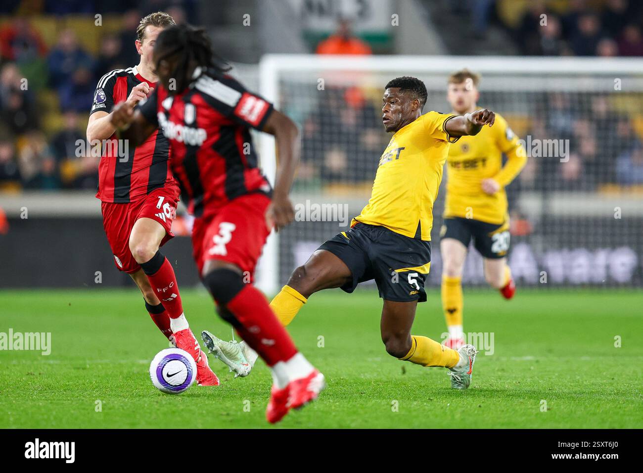 #5, Marshall Munetsi of Wolves slots the ball through the gap during ...