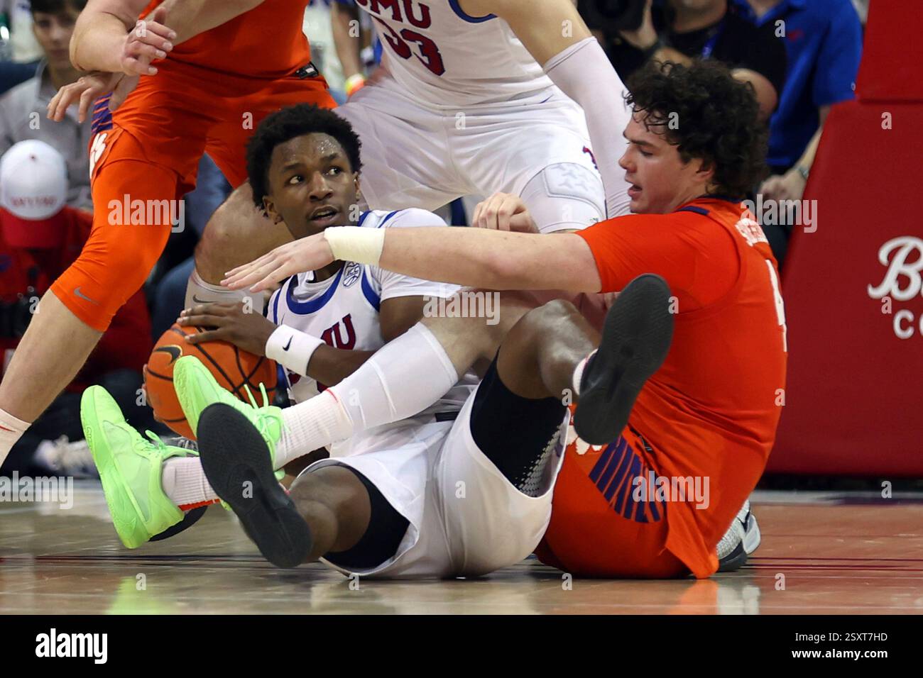 SMU guard Chuck Harris (3) and Clemson forward Ian Schieffelin (4 ...