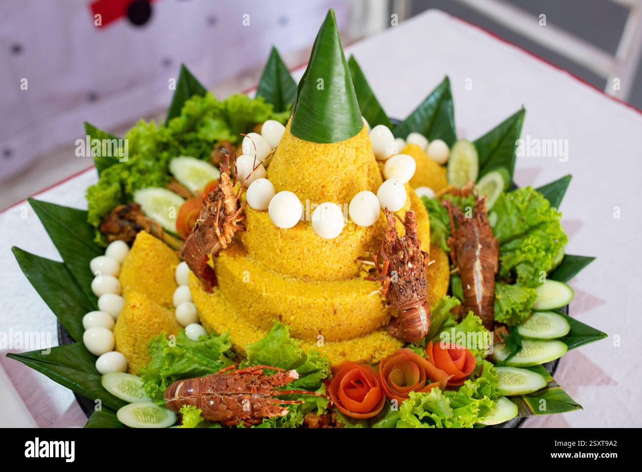 Nasi tumpeng with various decorations for birthday celebrations Stock ...