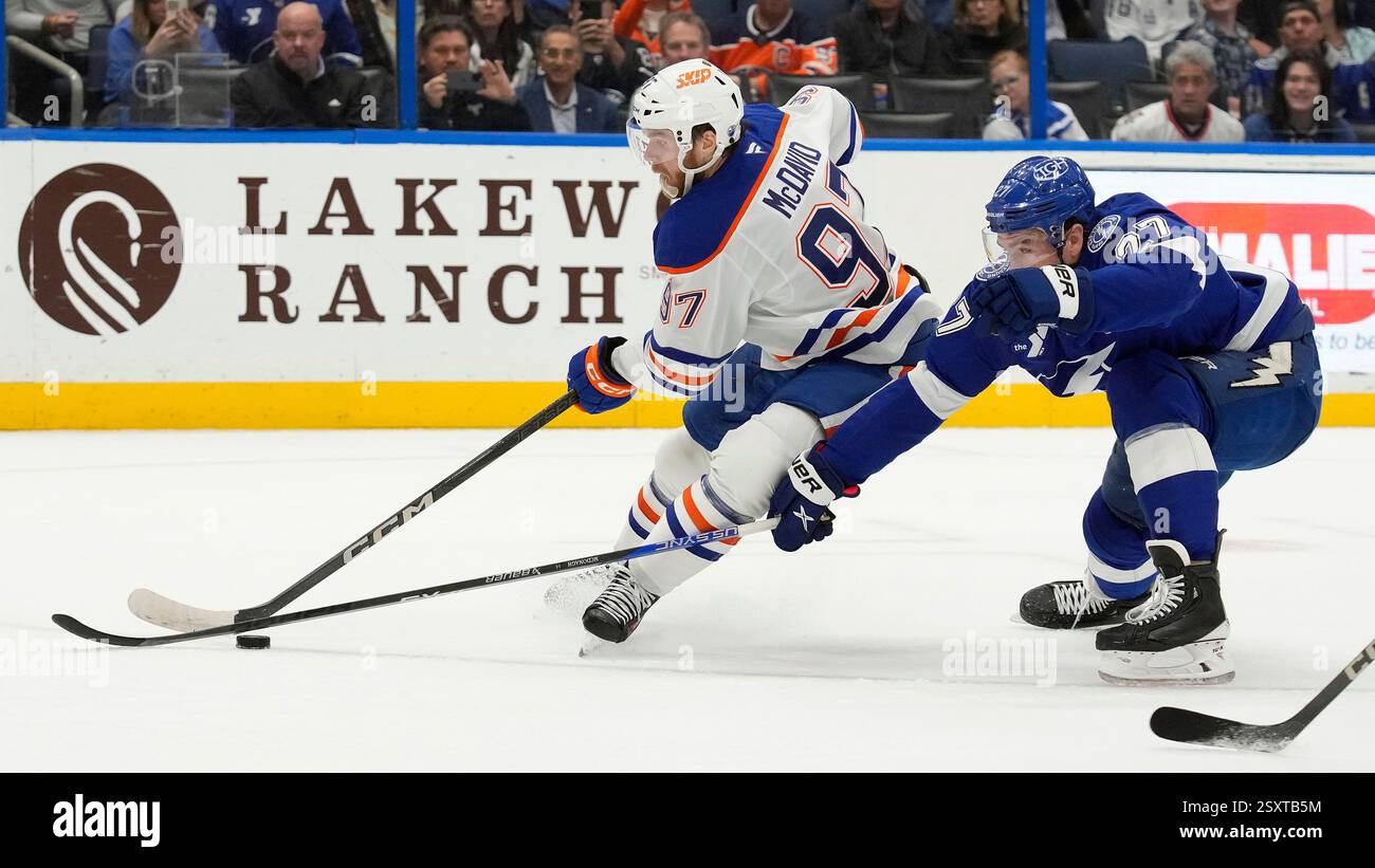 Edmonton Oilers center Connor McDavid gets around Tampa Bay Lightning ...