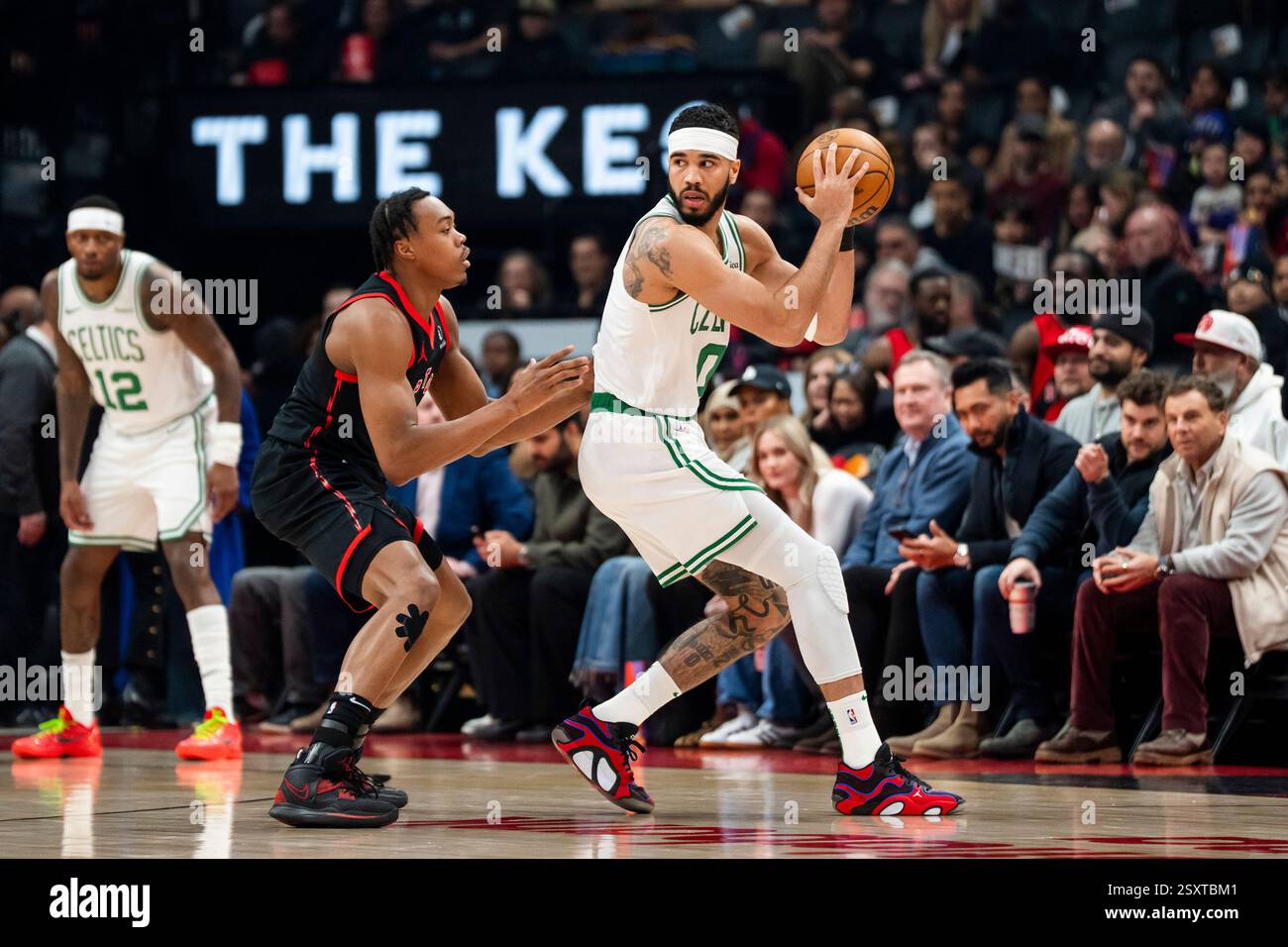 Boston Celtics forward Jayson Tatum plays the ball against Toronto ...