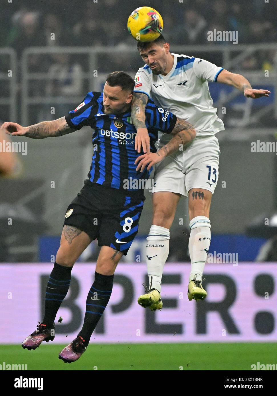 Milan, Italy. 25th Feb, 2025. Inter Milan's Marko Arnautovic (L) vies ...