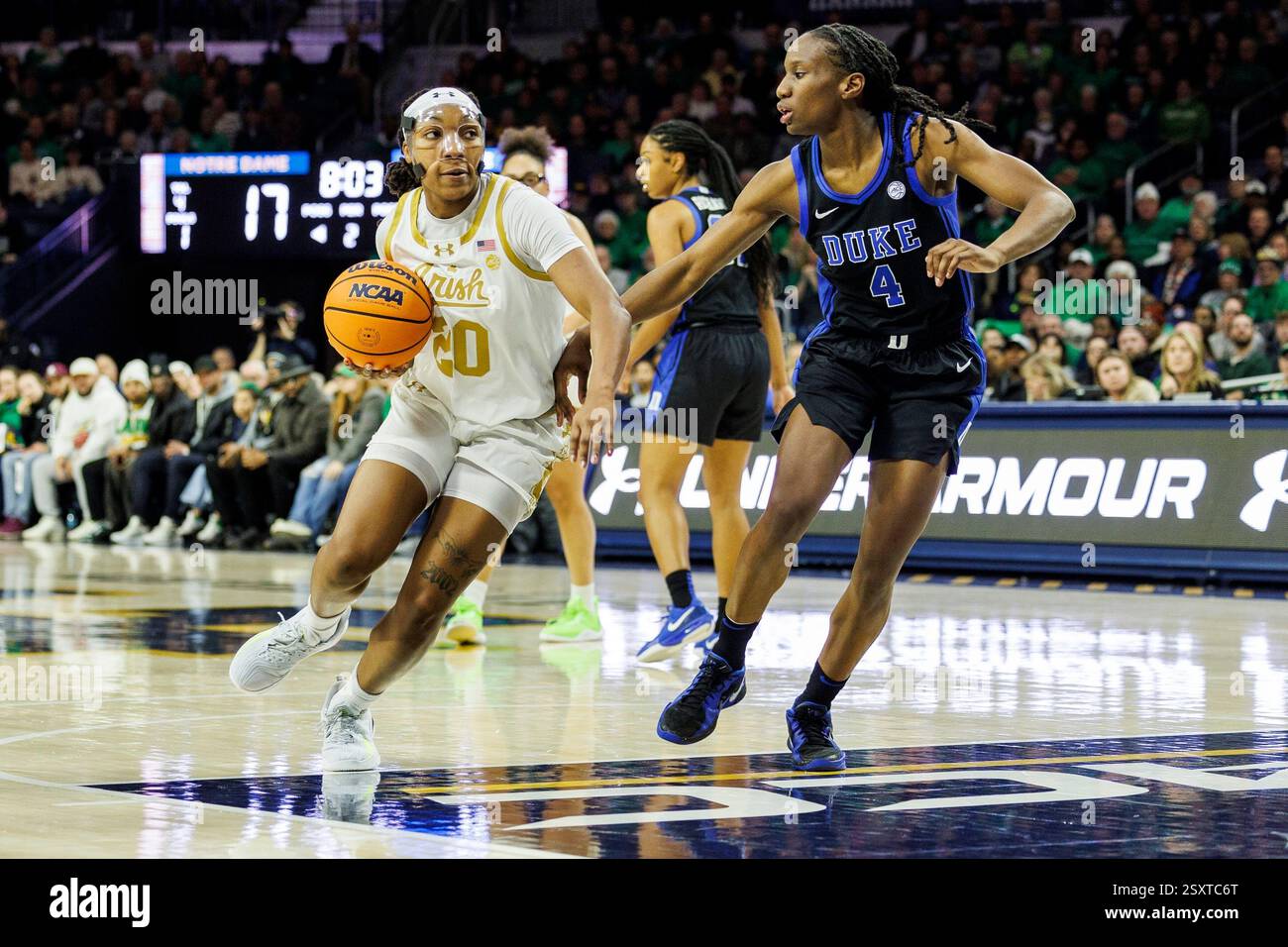 Notre Dame forward Liatu King (20) drives as Duke guard Jadyn Donovan ...