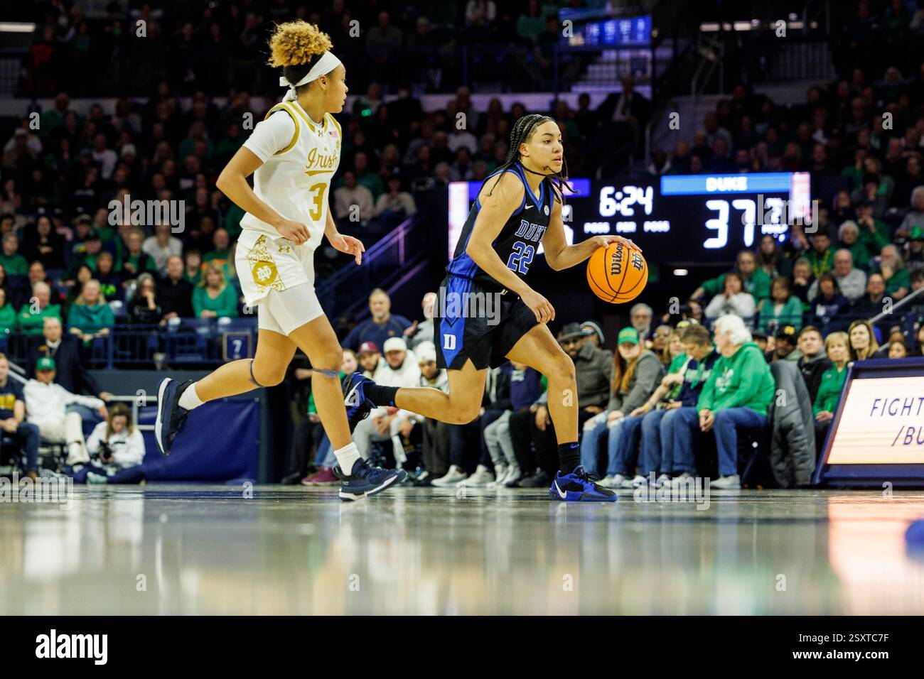 Duke guard Taina Mair (22) advances the ball as Notre Dame guard Hannah ...