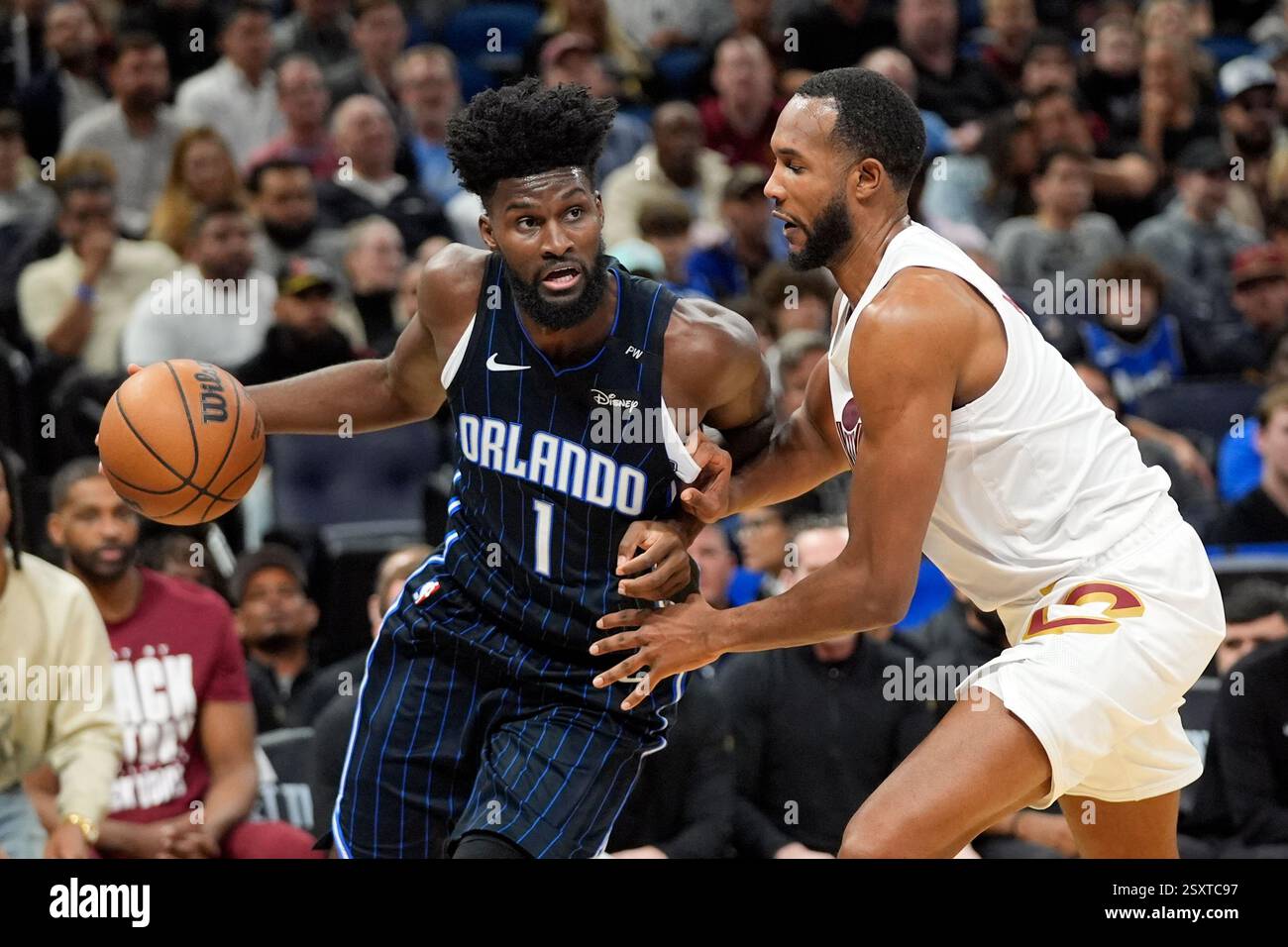 Orlando Magic forward Jonathan Isaac (1) drives around Cleveland ...