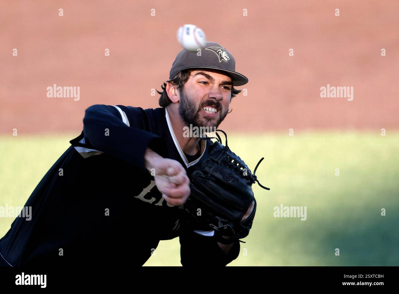 Lindenwood pitcher Bennett Stice delivers to a Missouri batter during ...