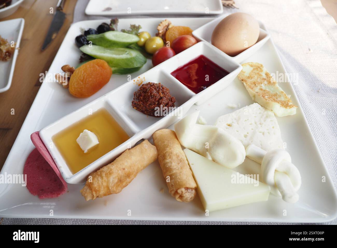 Diverse breakfast platter featuring assorted cheeses and fruits Stock ...