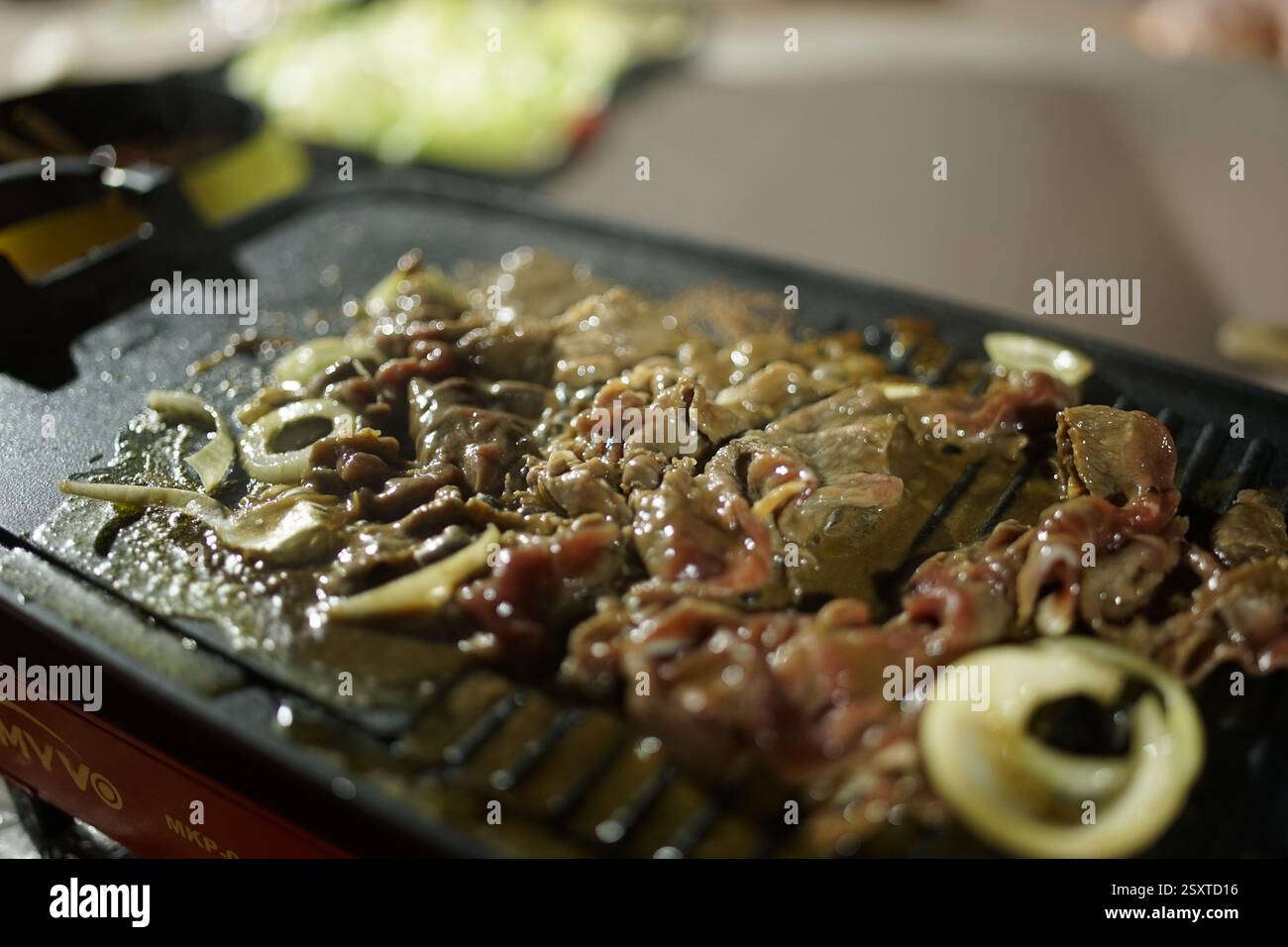 barbeque in the evening with beef Stock Photo - Alamy