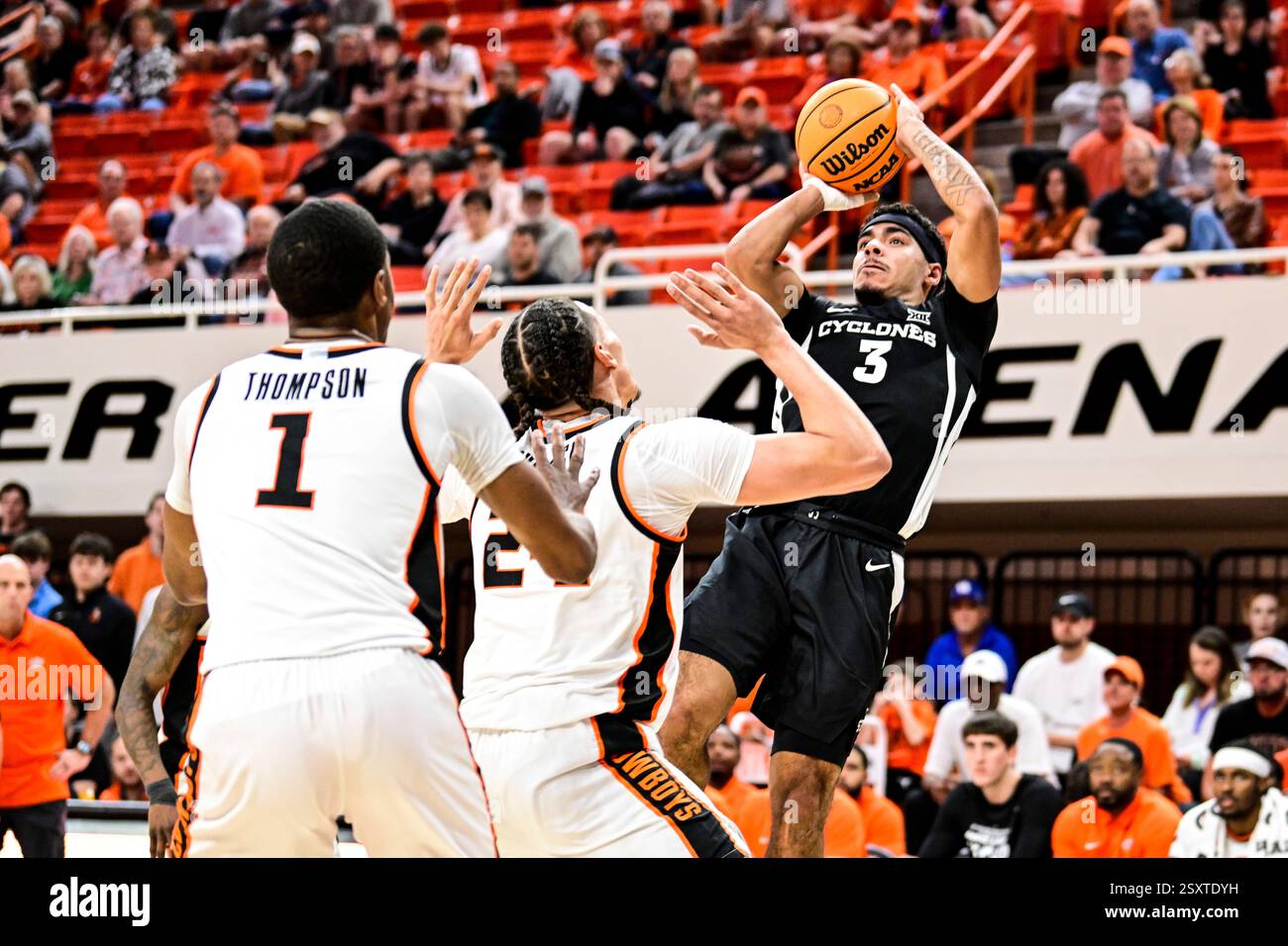 Iowa State guard Tamin Lipsey (3), right, looks to shoot against ...