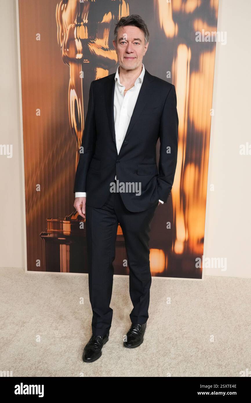 Peter Straughan arrives at the Oscars Nominees Dinner on Tuesday, Feb ...