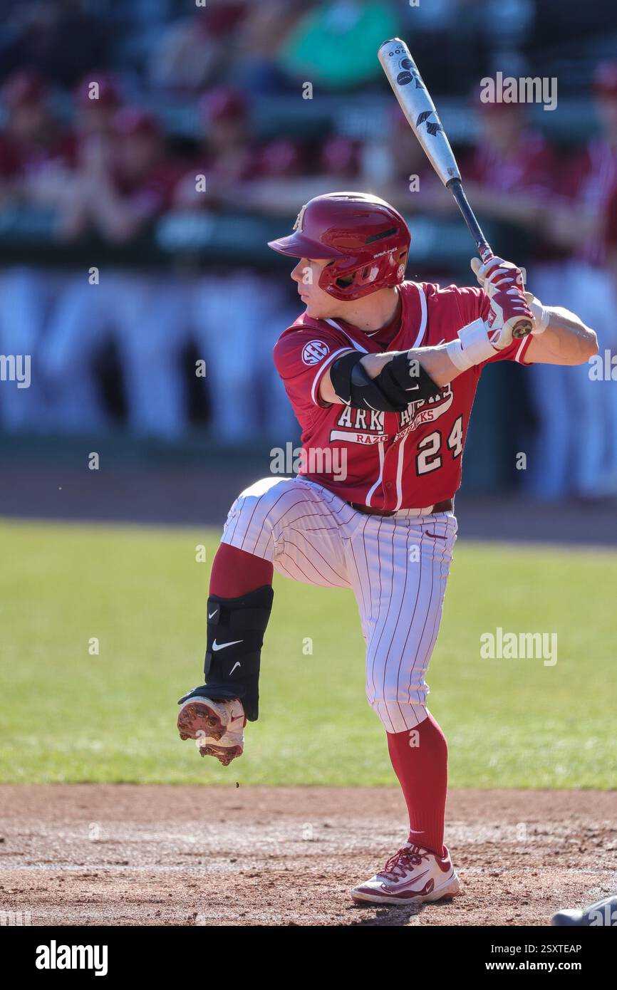 February 25, 2025: Arkansas hitter Charles Davalan (24) begins his ...