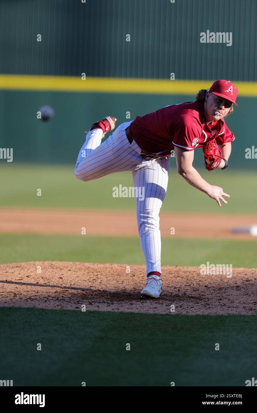 February 25, 2025: Razorback pitcher Aiden Jimenez (16) watches as the ...
