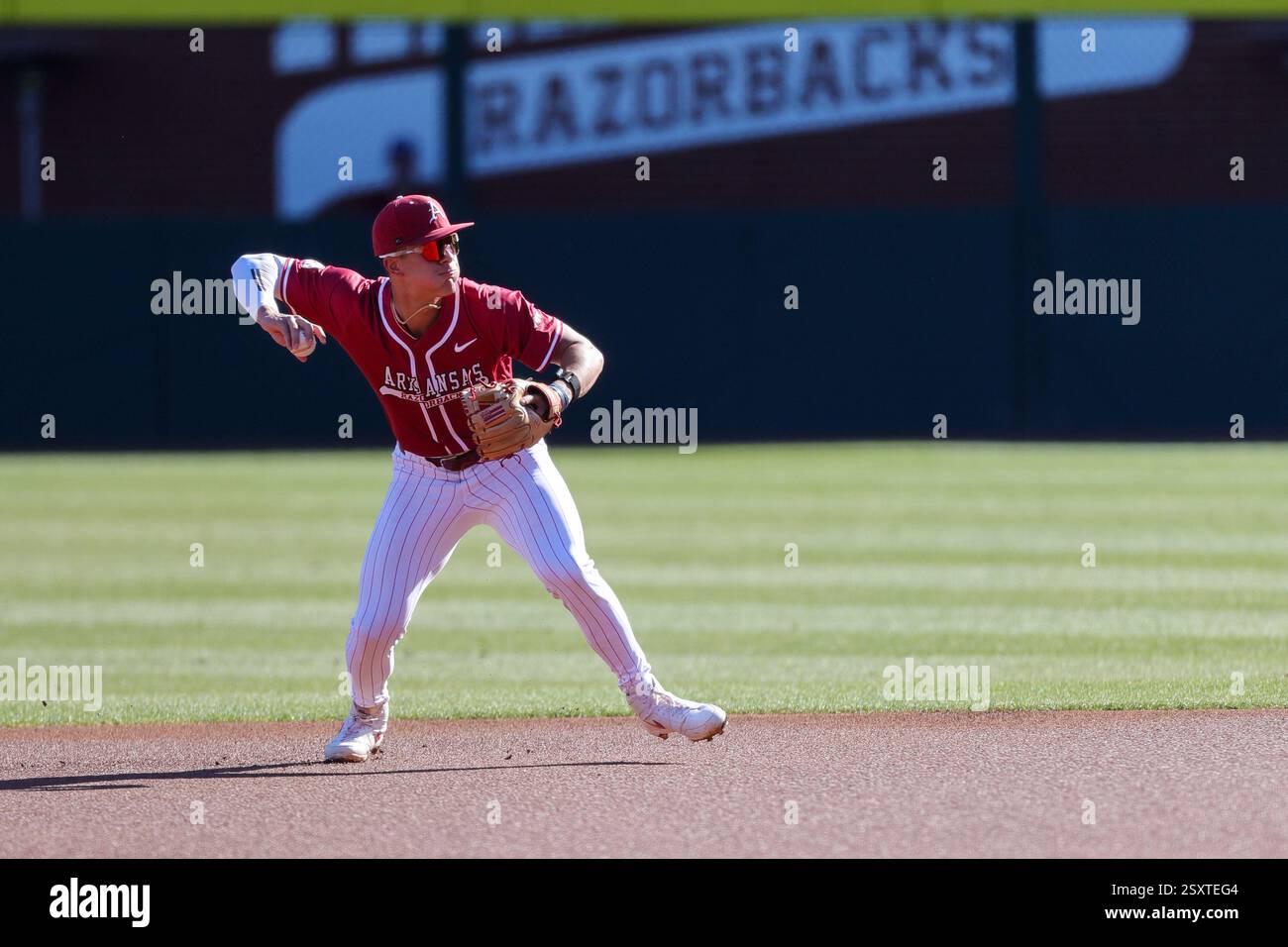February 25, 2025: Razorback infielder Nolan Souza (3) prepares to make ...