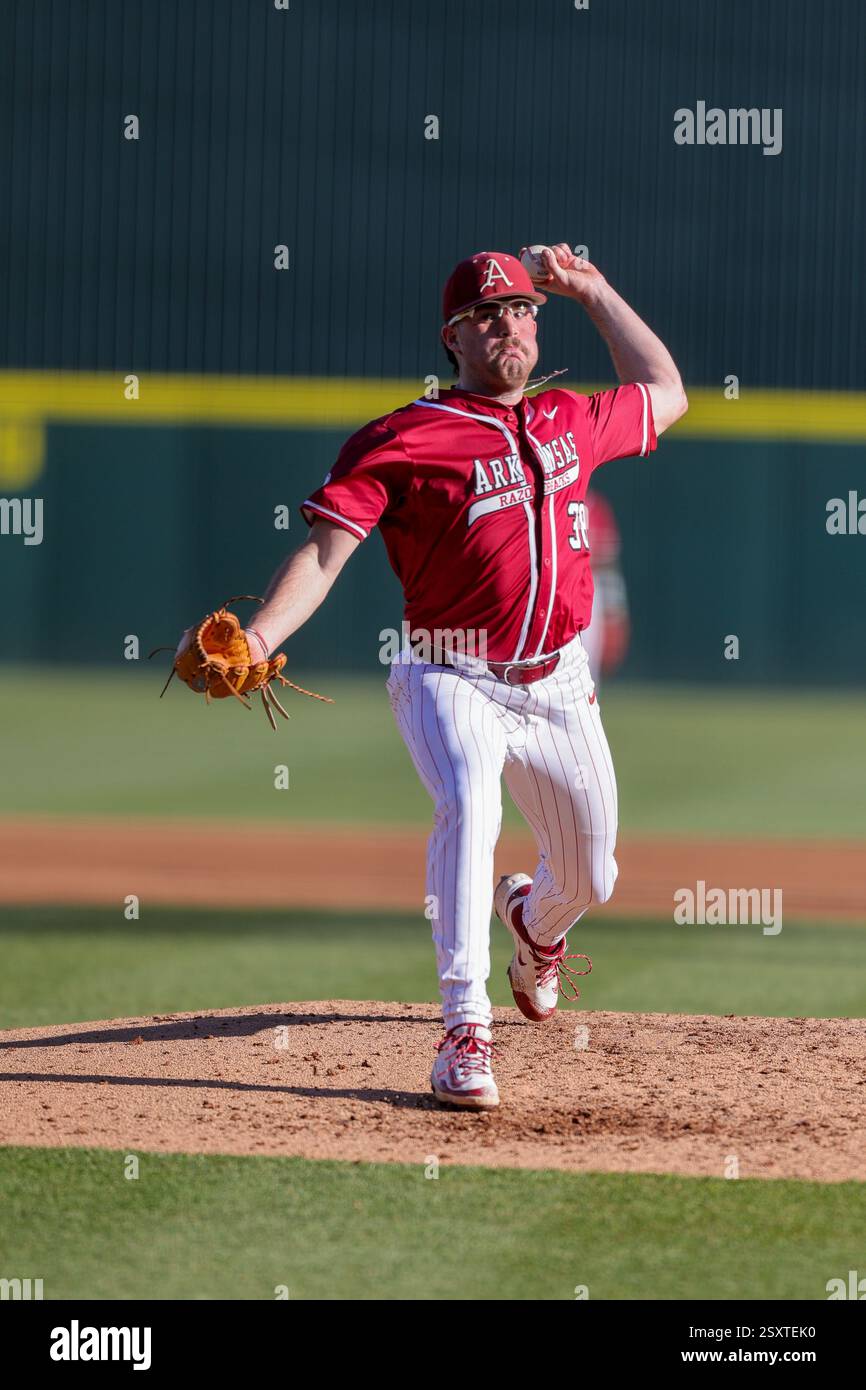 February 25, 2025: Colin Fisher (38) Arkansas pitcher prepares to ...