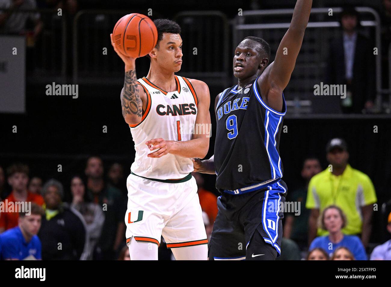 CORAL GABLES, FL - FEBRUARY 25: Miami center Lynn Kidd (1) handles the ...