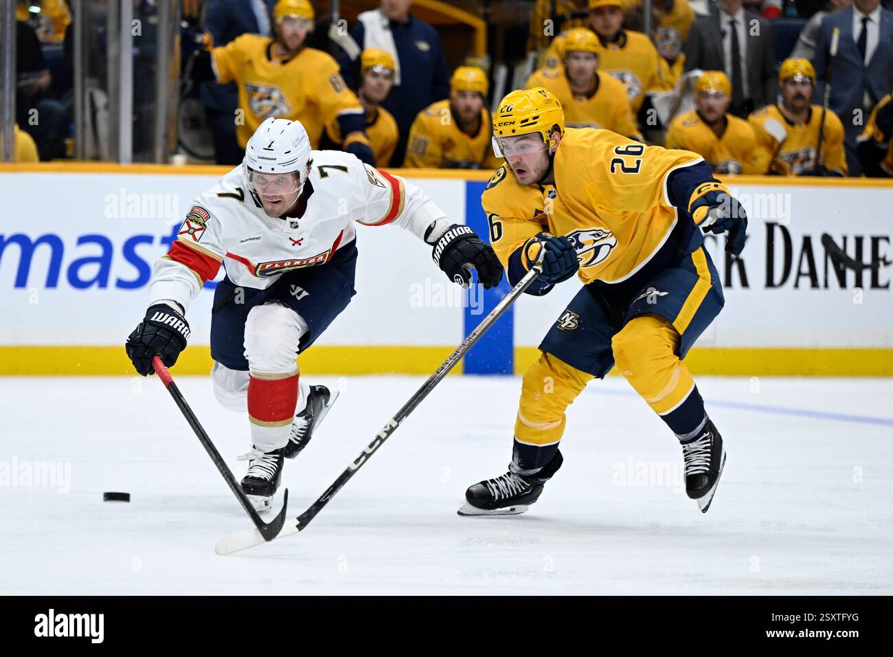 Florida Panthers defenseman Dmitry Kulikov (7) and Nashville Predators left wing Kieffer Bellows ...