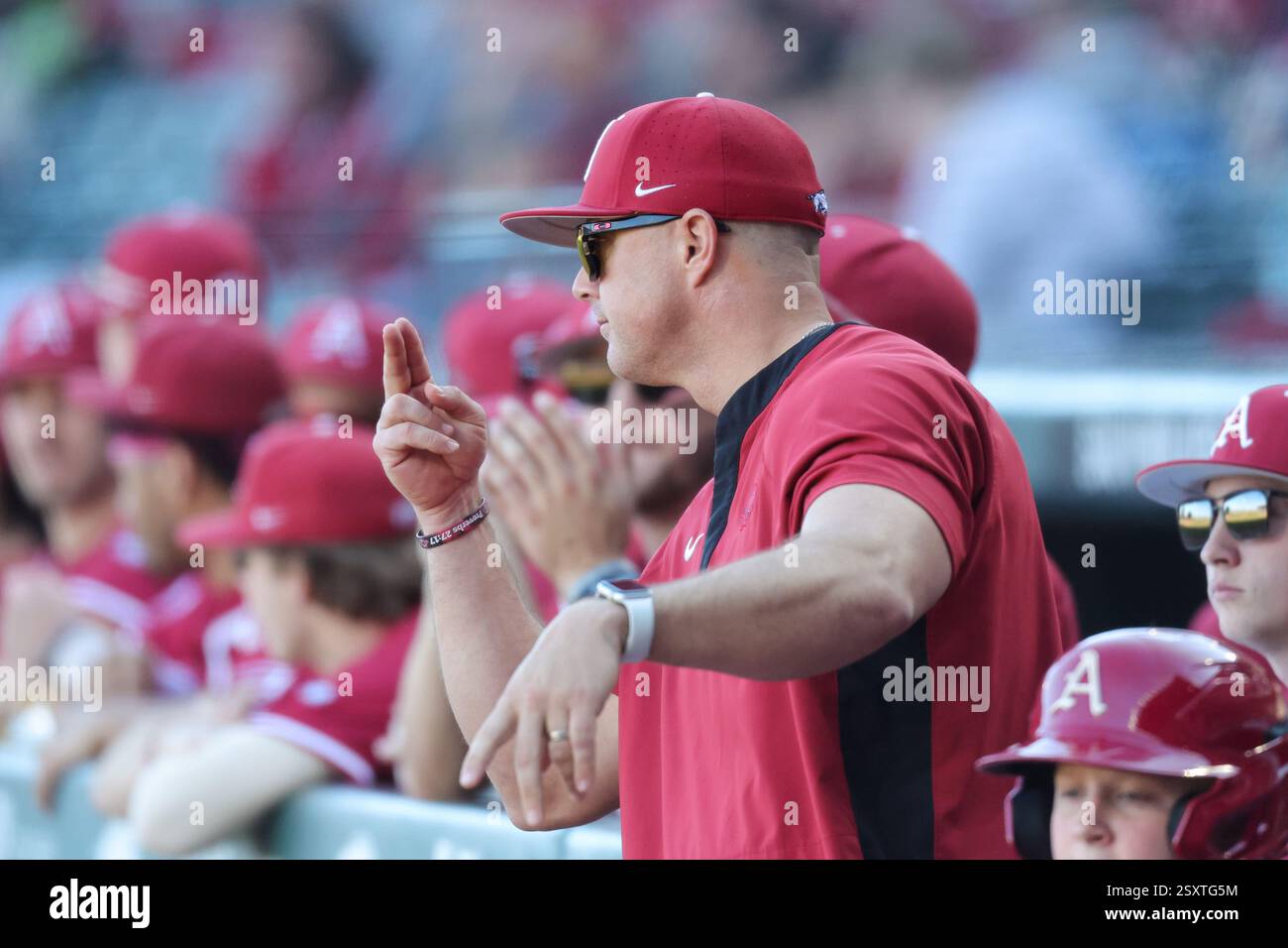 February 25, 2025: Arkansas Assistant Coach Nate Thompson signals from ...