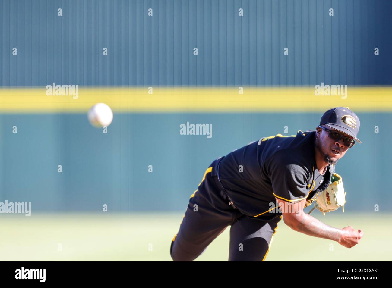 February 25, 2025: Tigers pitcher Derrell Fletcher (21) watches as his ...