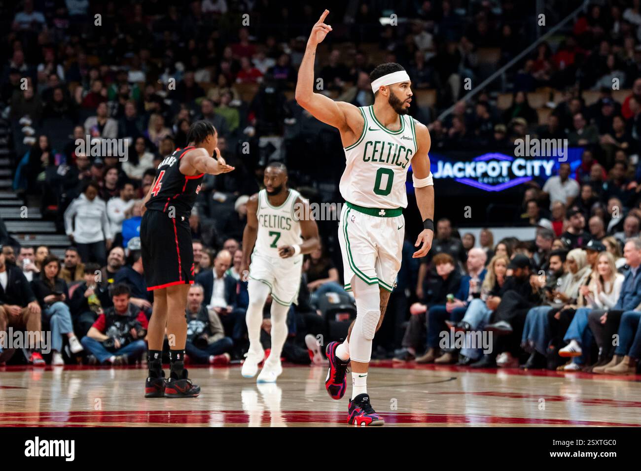Boston Celtics forward Jayson Tatum (0) reacts to scoring a point ...