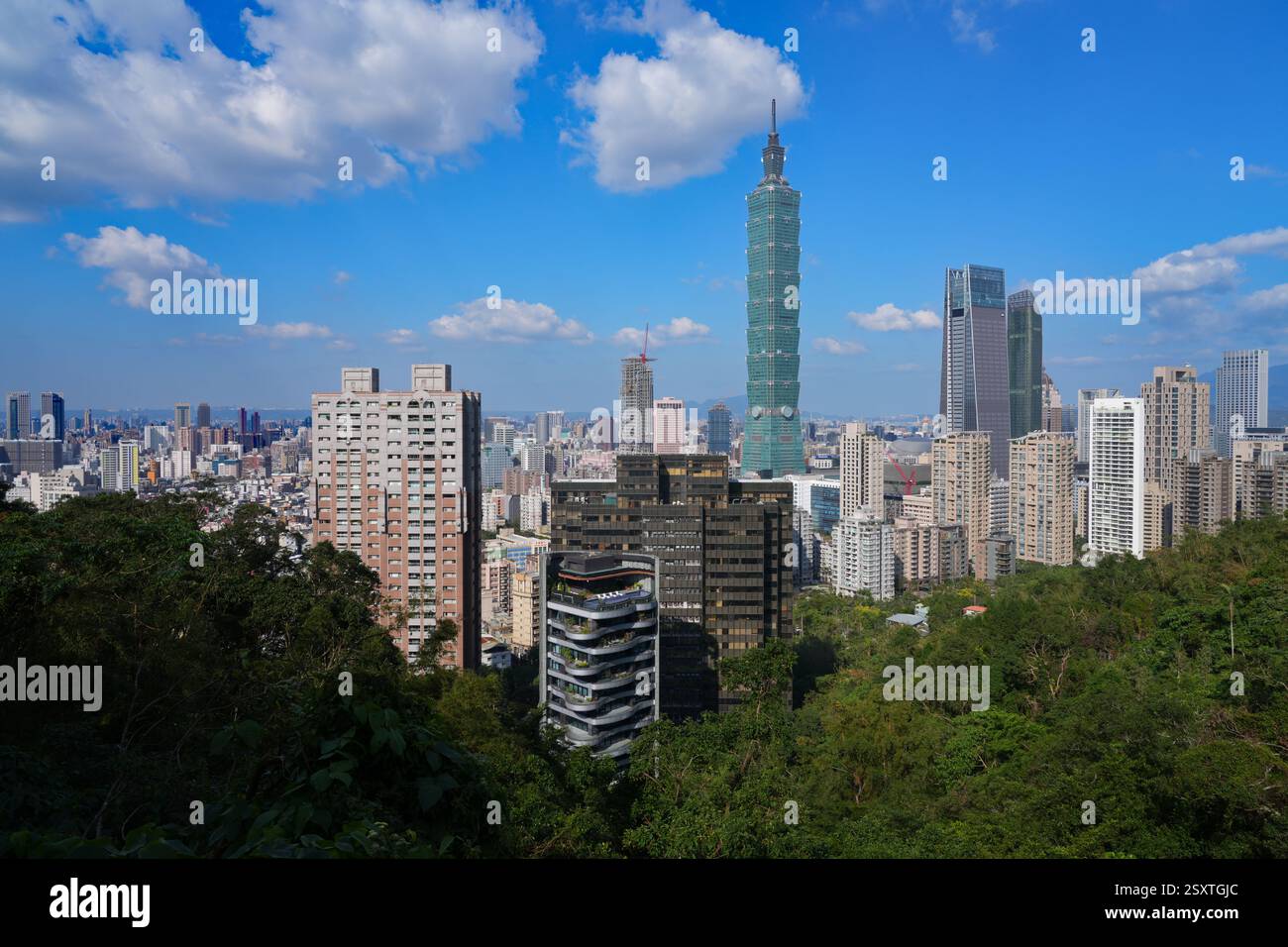 TAIPEI, TAIWAN -12 JAN 2025- Day view of Taipei 101 and other buildings ...